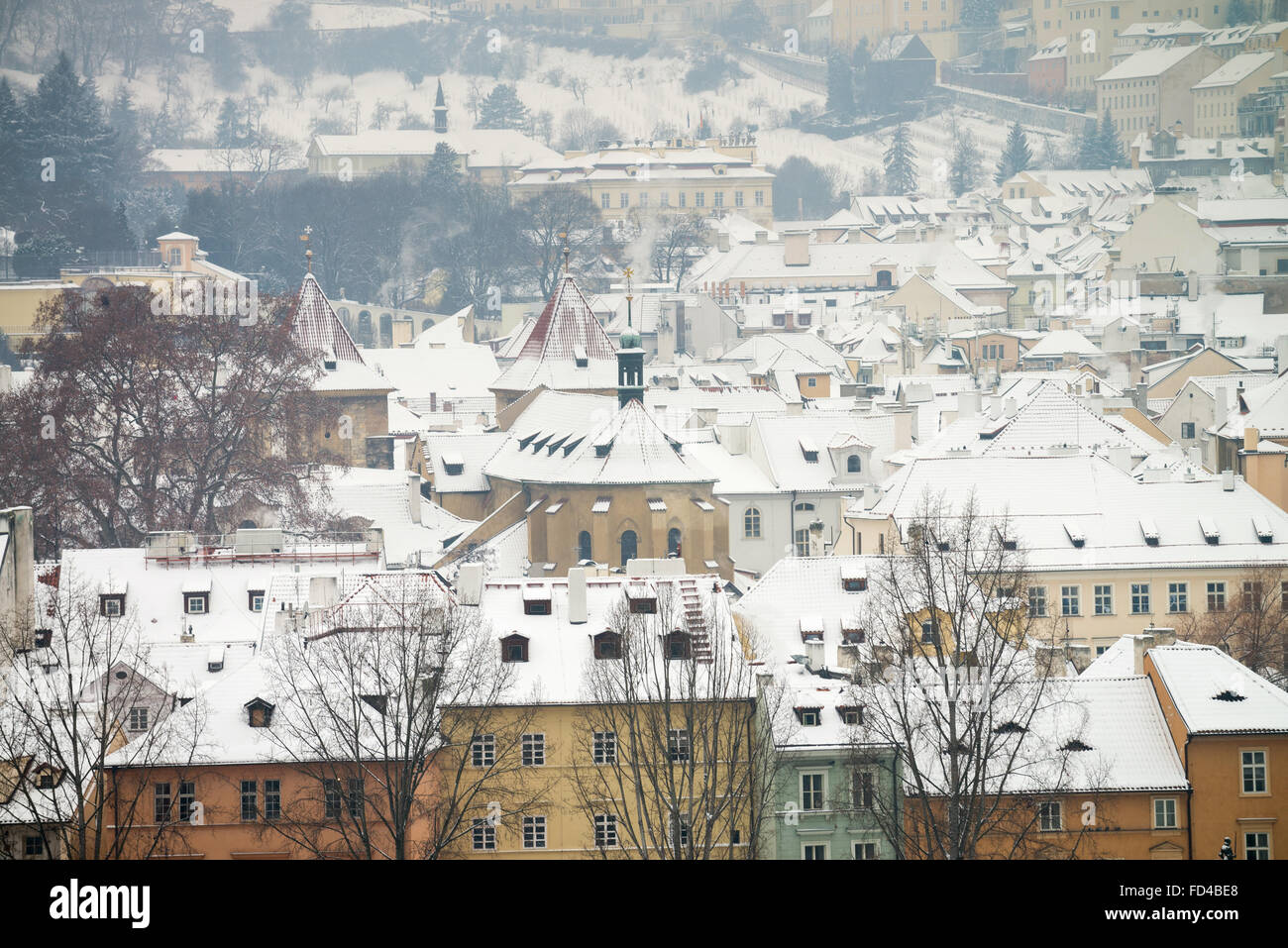 River Vltava and the colorful baroque houses in winter near Charles ...