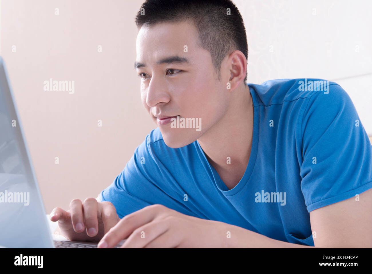 Young man online banking using hi-res stock photography and images - Alamy