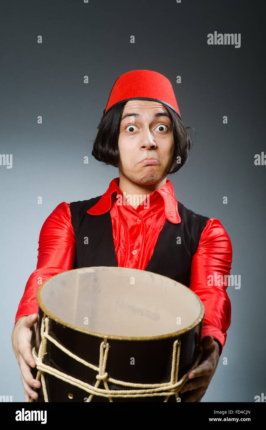 The man wearing red fez hat Stock Photo - Alamy