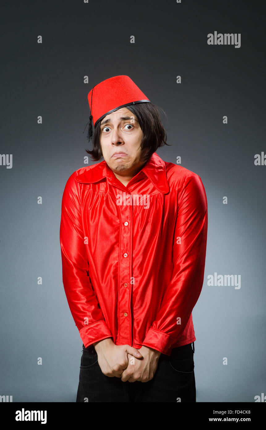 The man wearing red fez hat Stock Photo - Alamy