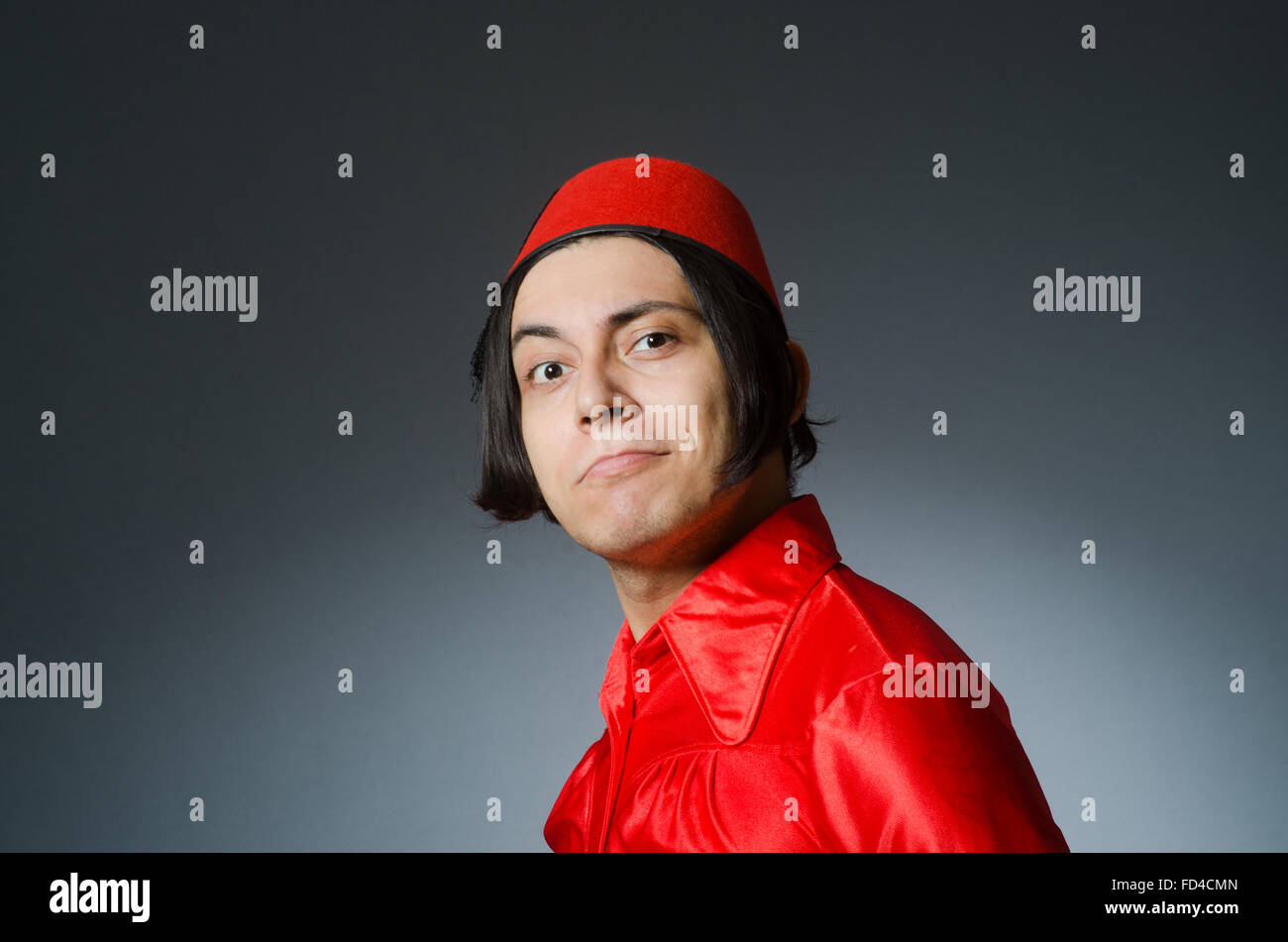 The man wearing red fez hat Stock Photo - Alamy