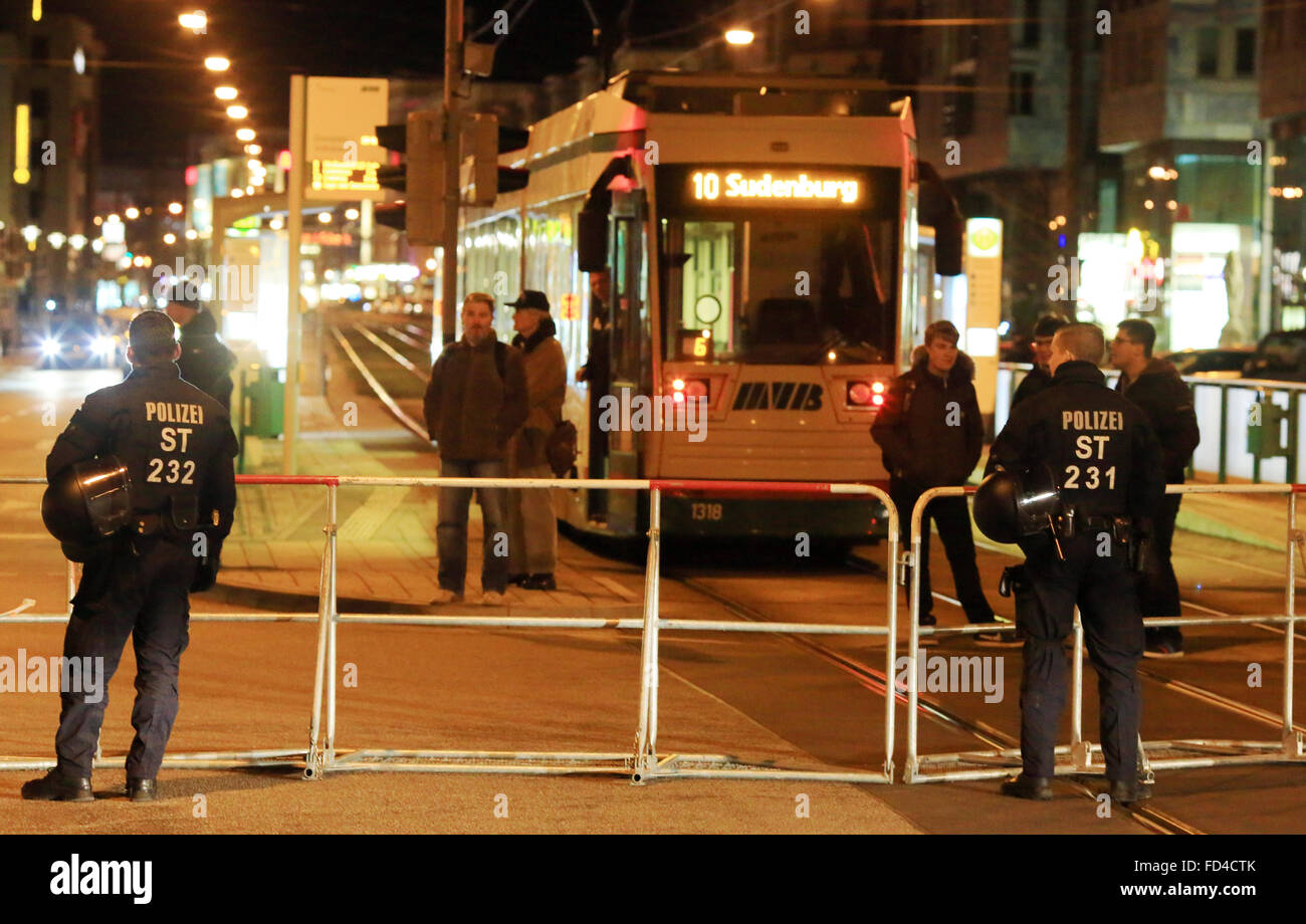 Magdeburg, Germany. 27th Jan, 2016. Police officers stand in front of ...