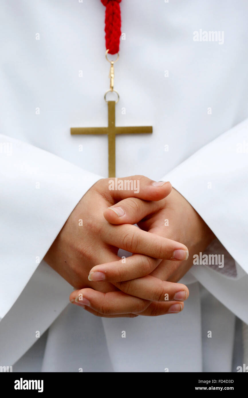 Praying altar boy Stock Photo - Alamy