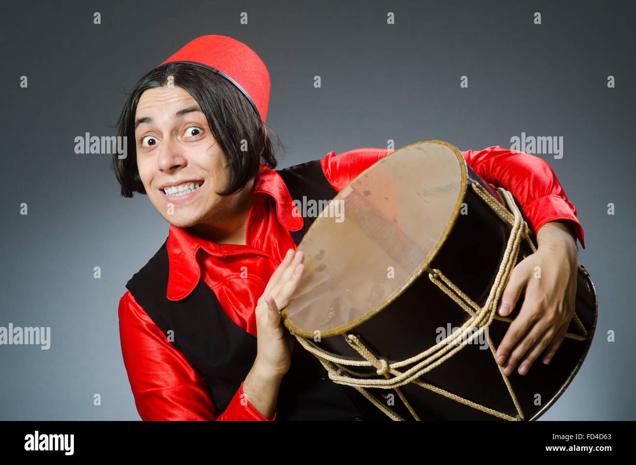 The man wearing red fez hat Stock Photo - Alamy