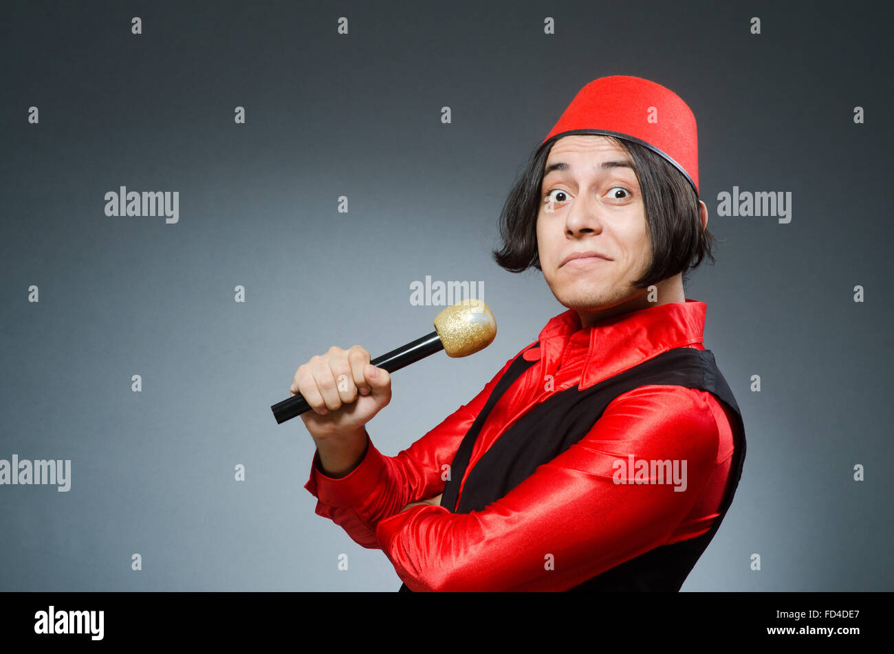 The man wearing red fez hat Stock Photo - Alamy