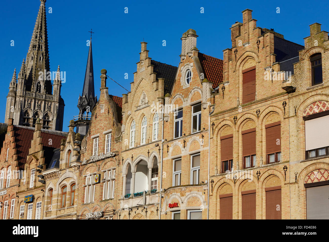 Cathedral spire and Flemish houses in Ypres Stock Photo - Alamy