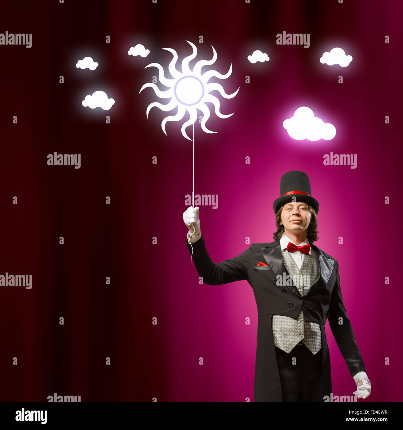 Image of man magician with balloon against color background Stock Photo ...