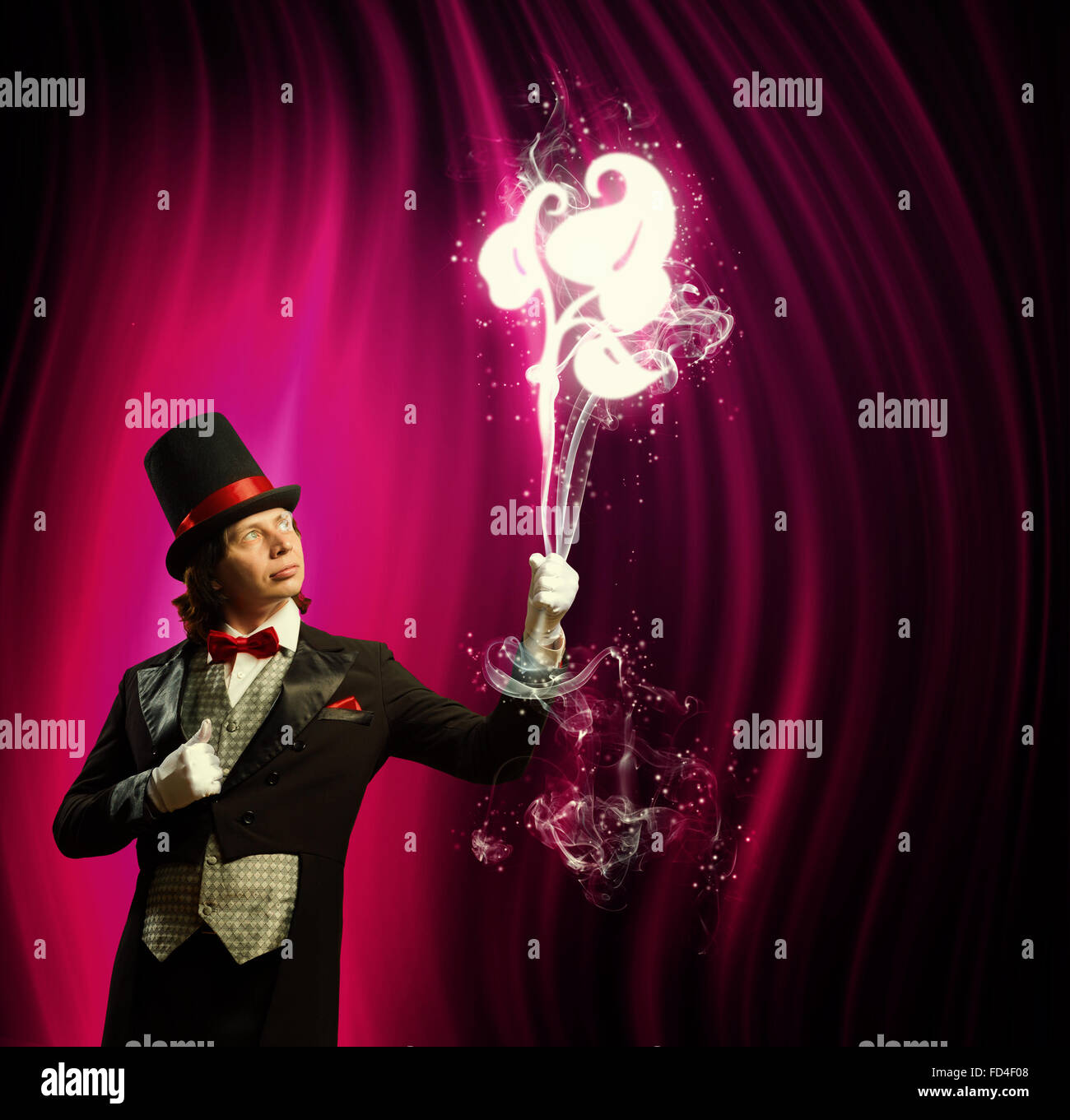 Magician trick wand hat flower hi-res stock photography and images - Alamy