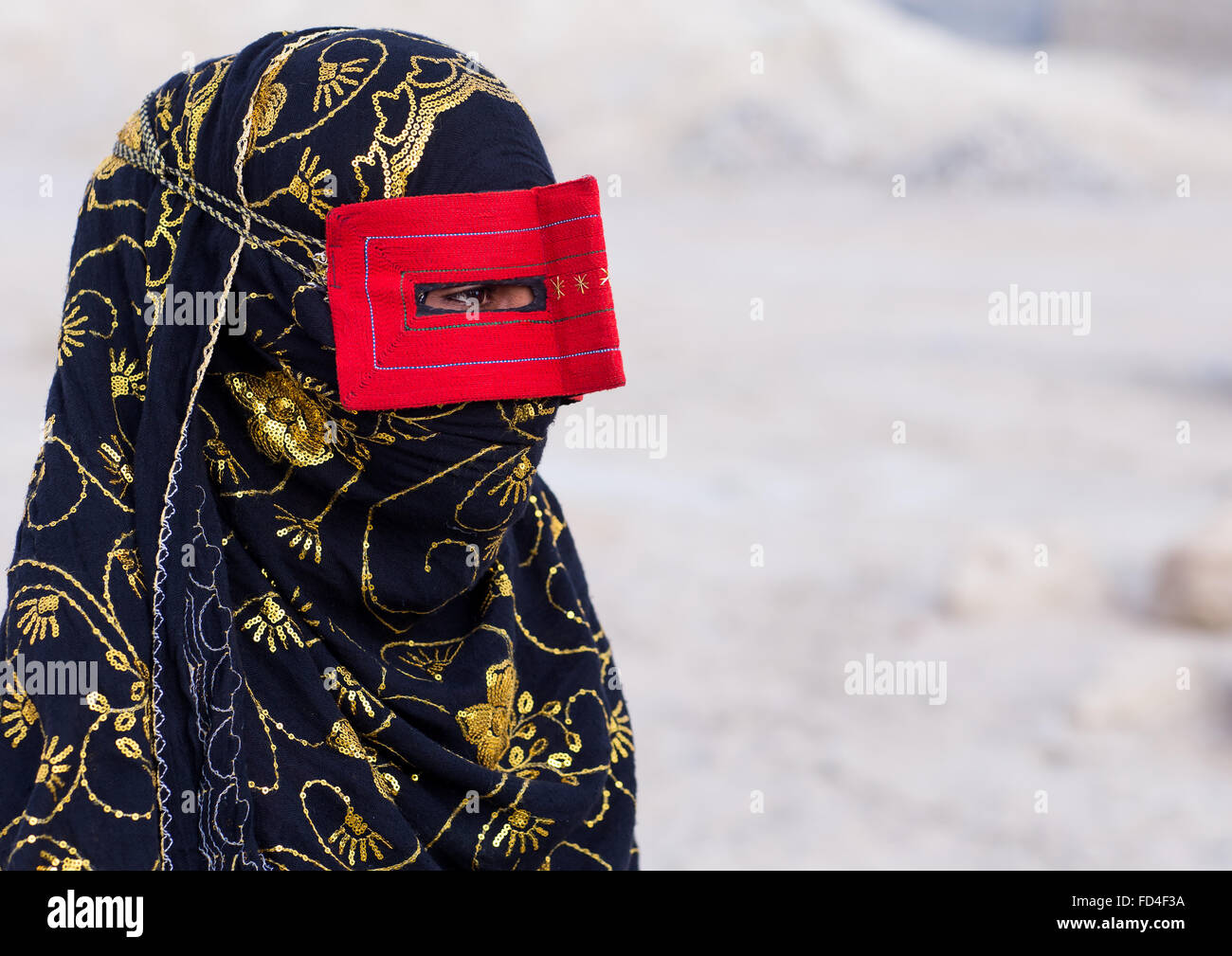 a bandari woman wearing a traditional mask called the burqa, Qeshm ...