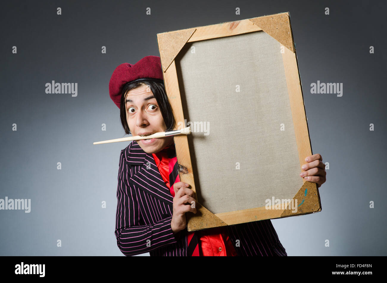 The funny artist with his artwork Stock Photo - Alamy