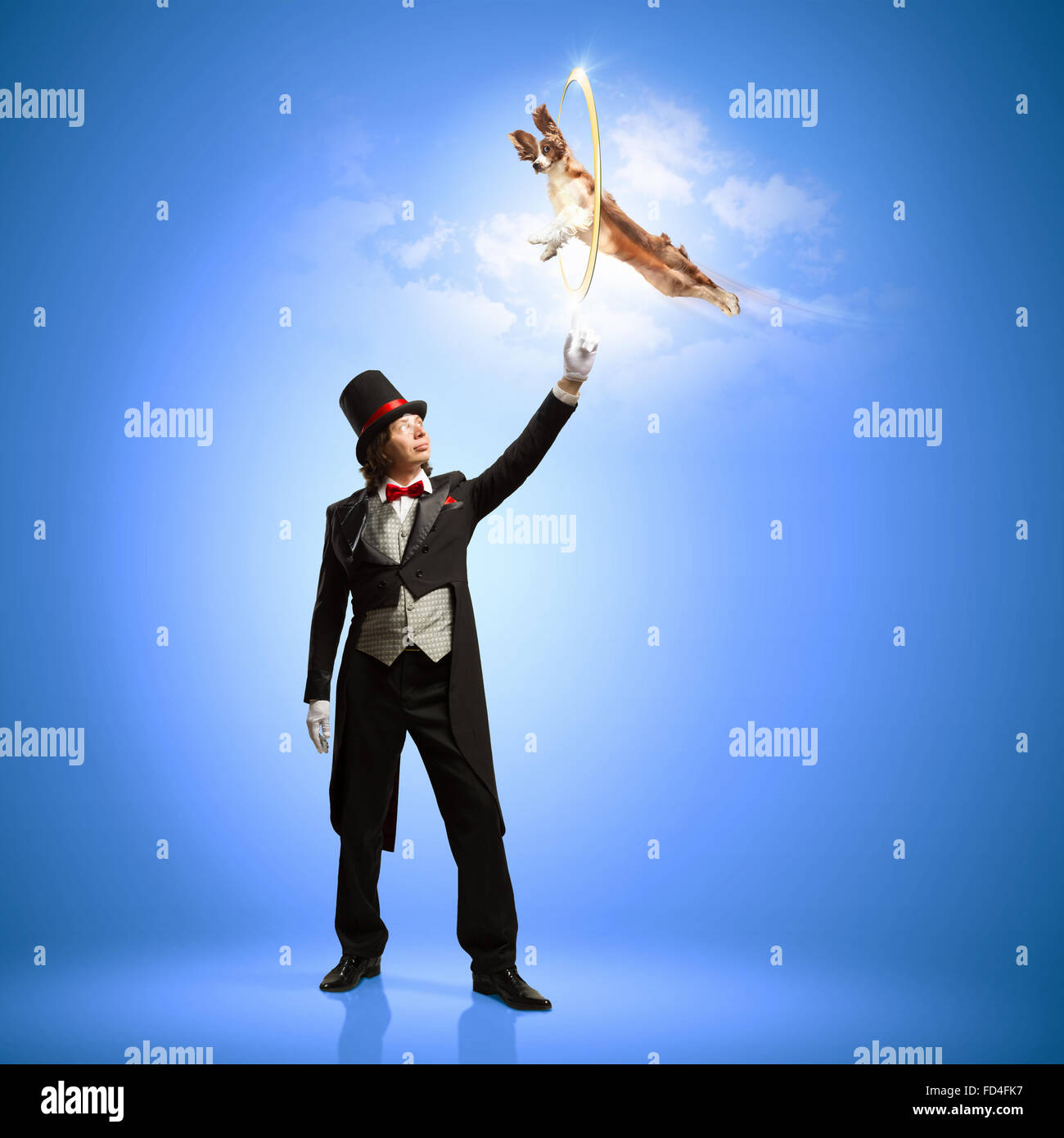 Image of wizard in hat catching clouds Stock Photo - Alamy