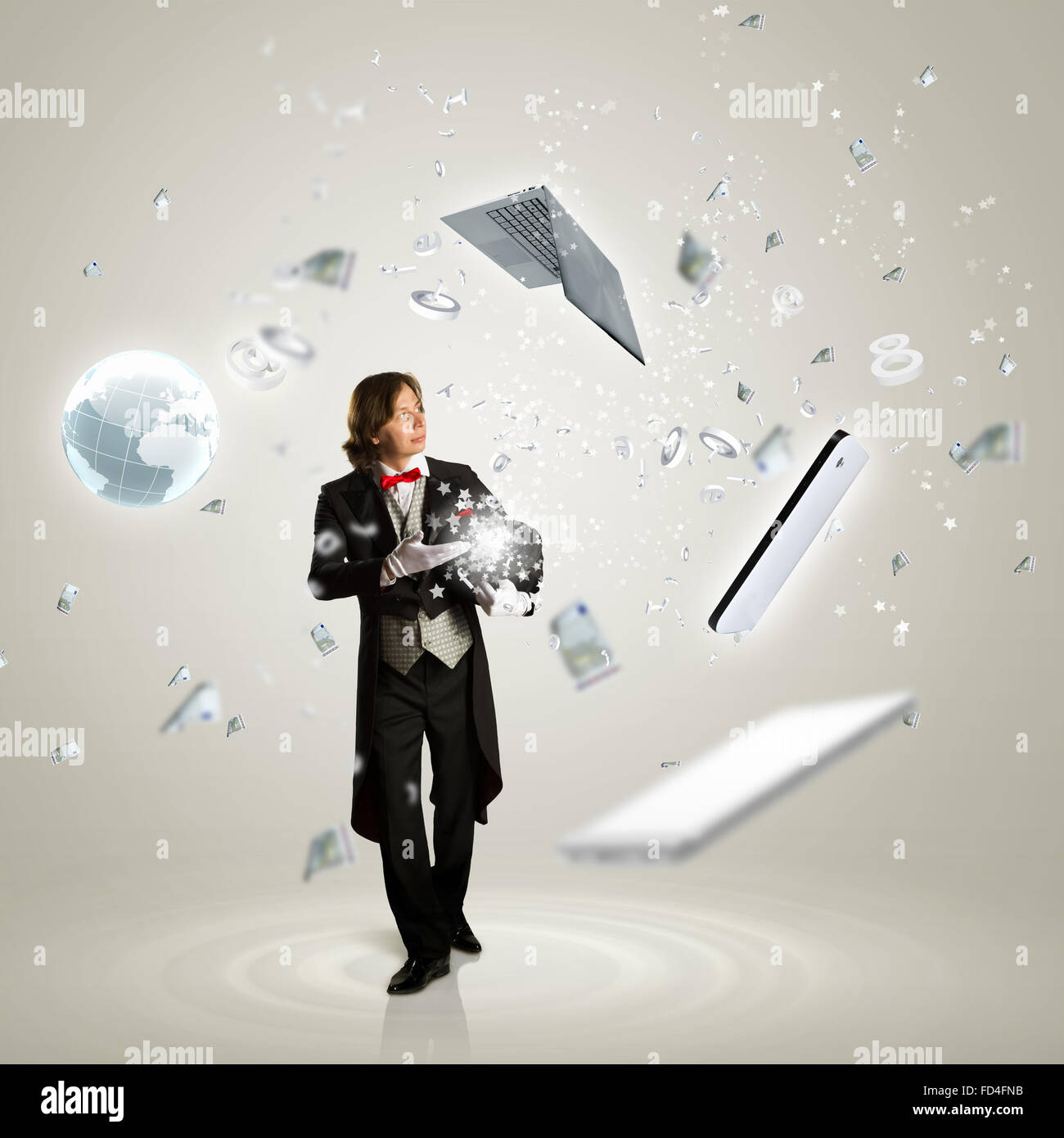 Image of magician with hat and computer devices flying in air Stock ...
