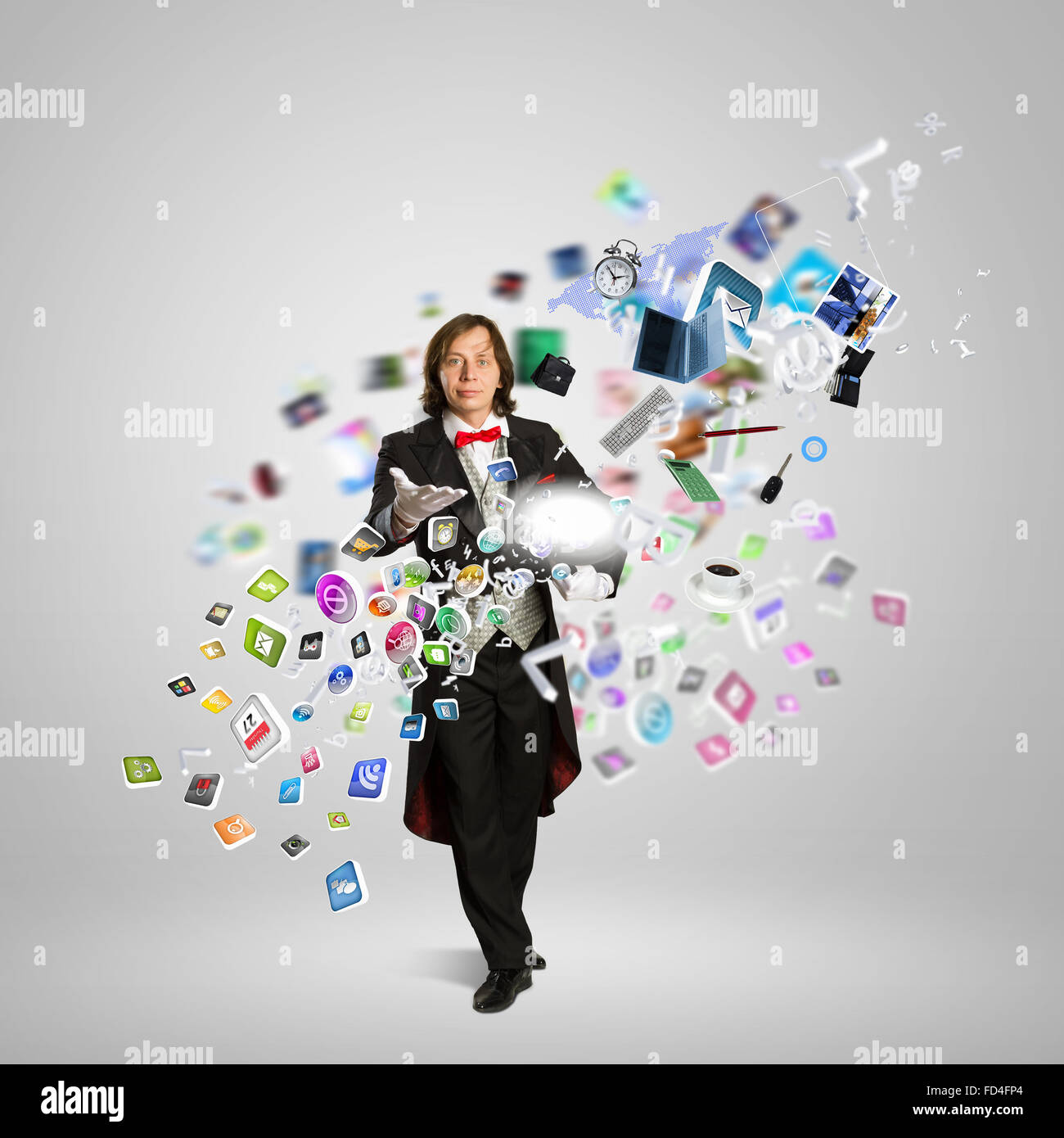 Image of magician with hat computer devices flying in air hi-res stock ...