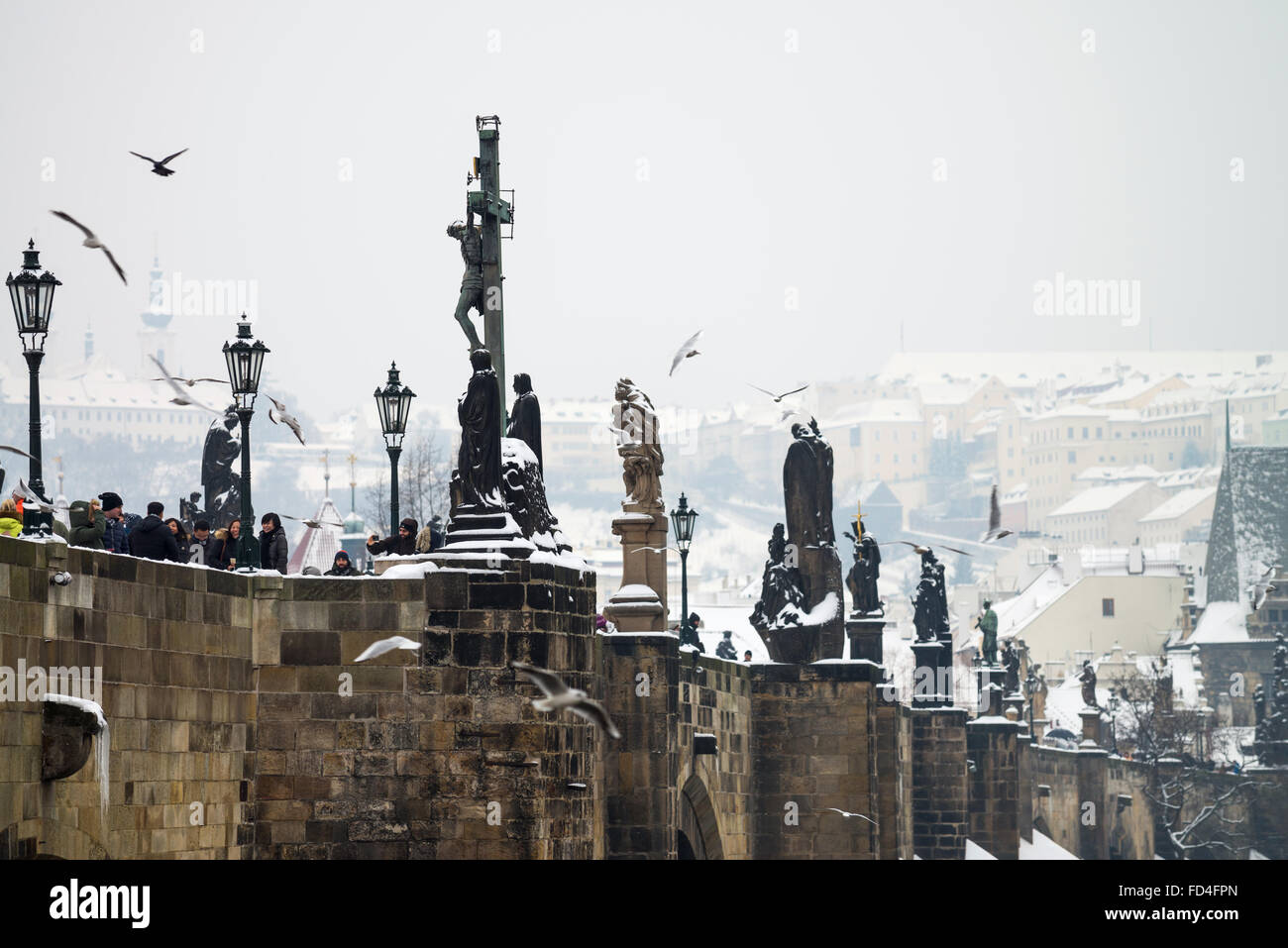 Prague winter charles bridge snow hi-res stock photography and images ...