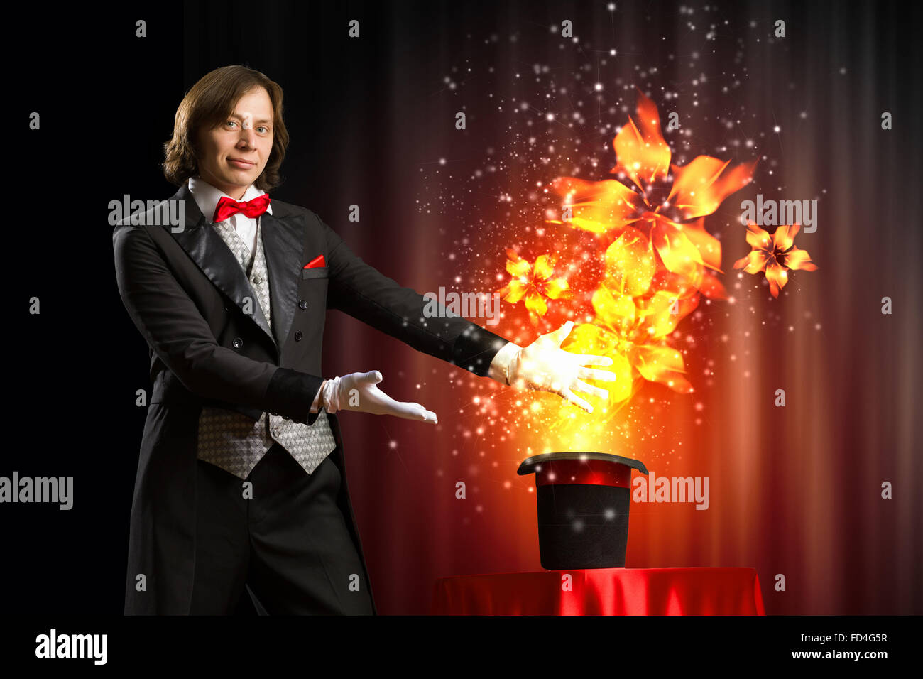 Image of magician showing tricks with magic hat Stock Photo - Alamy