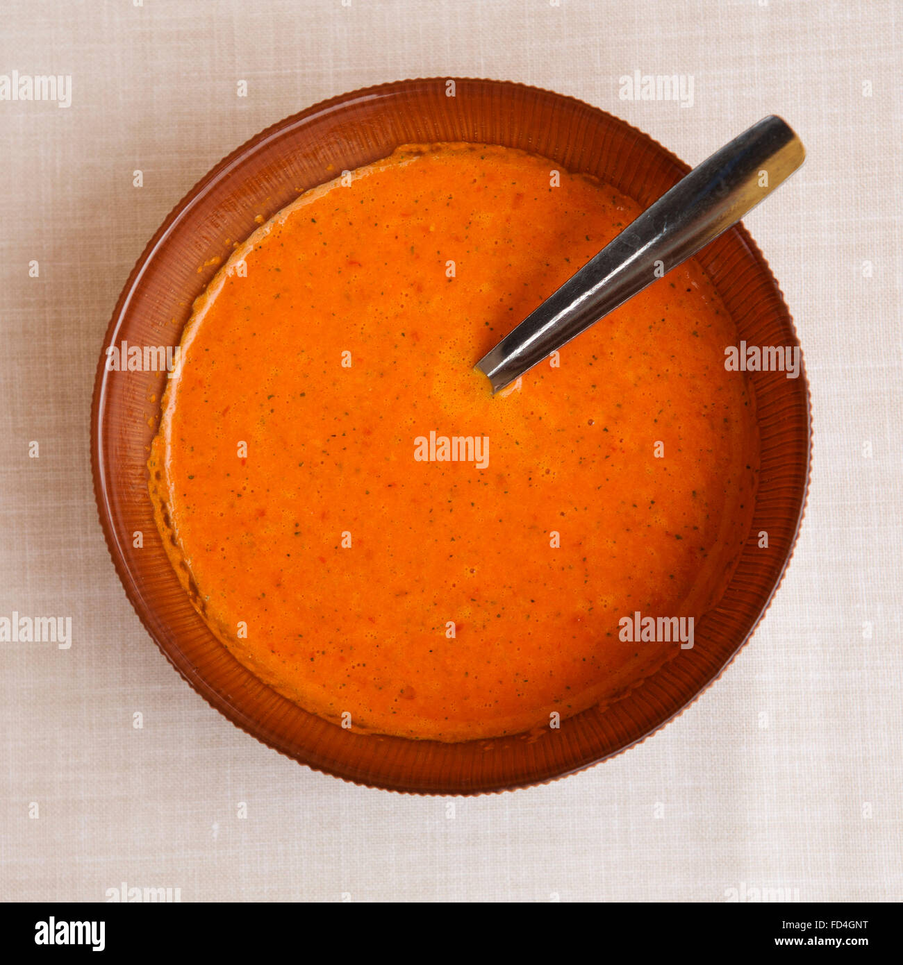 A bowl of spicy mojo rojo sauce served in Tenerife, Spain. The sauce is ...