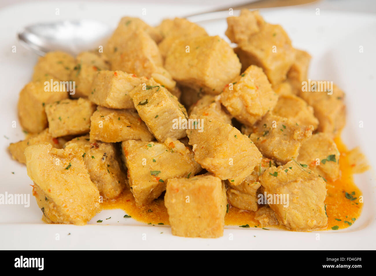 Carne Fiesta (marinaded pork) served in Tenerife, Spain. The foods are ...