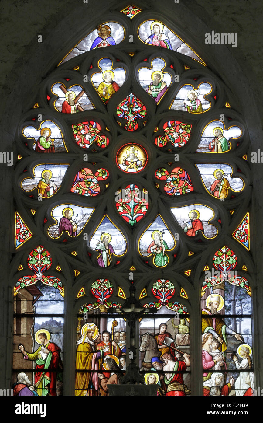 Stained glass window. God, Mary, Jesus and the twelve apostles Stock ...