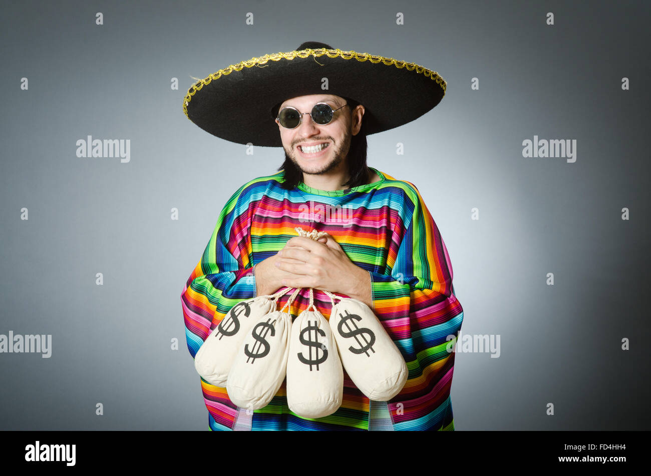 The mexican man with money sacks Stock Photo - Alamy
