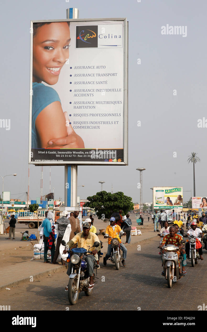 Motorcycle lane and billboard in Cotonou Stock Photo - Alamy