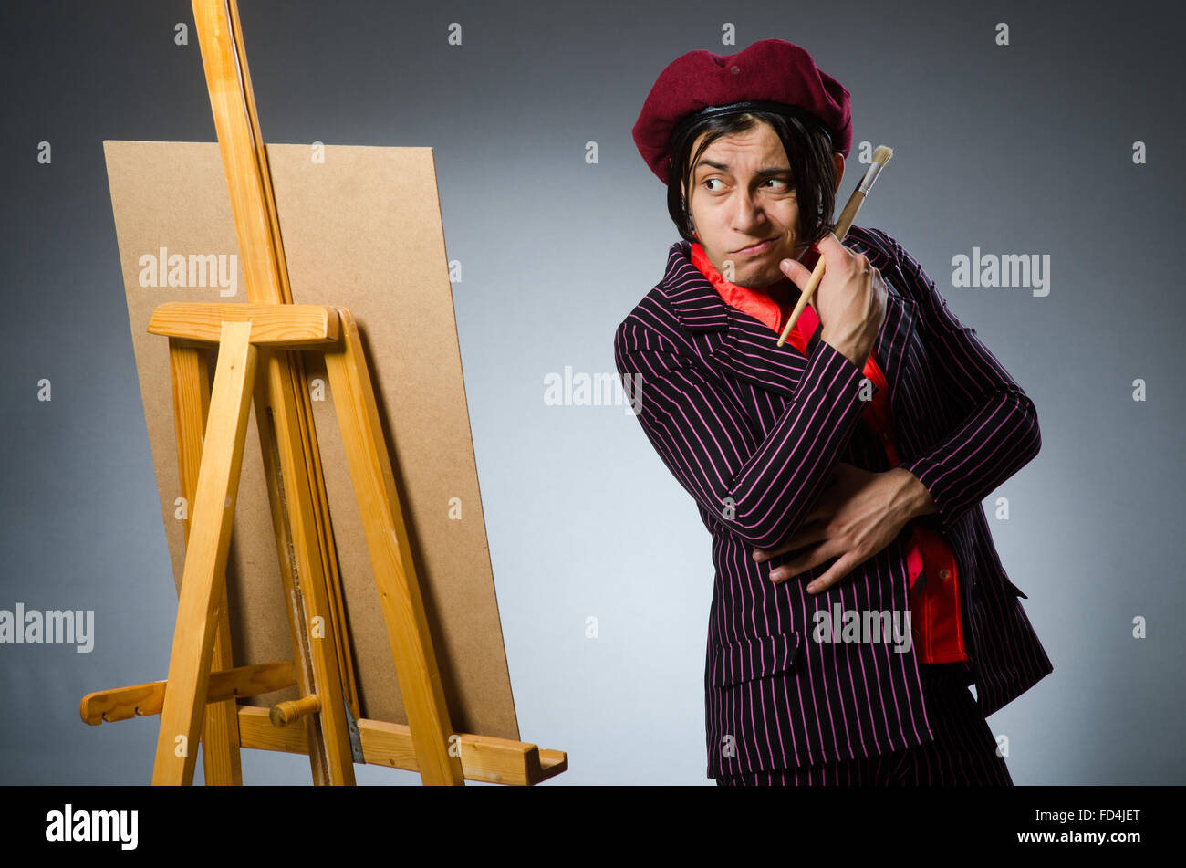 The funny artist with his artwork Stock Photo - Alamy