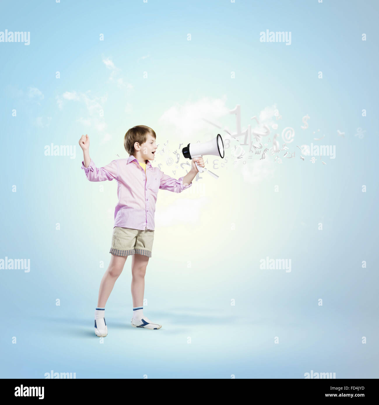Image of little cute boy shouting in megaphone Stock Photo - Alamy