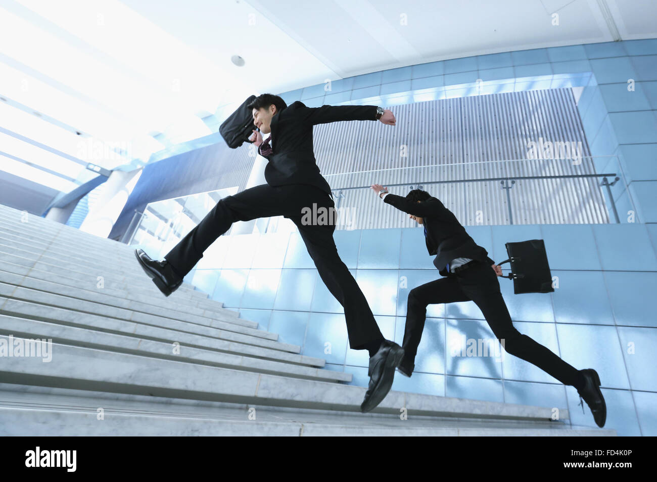 Young japanese businessman jumping hi-res stock photography and images ...