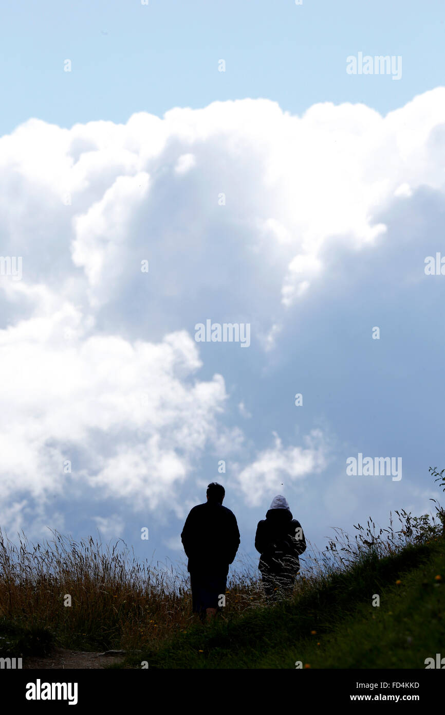 Couple walking on a path Stock Photo - Alamy