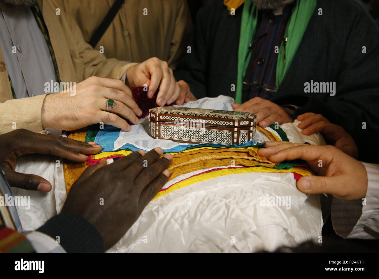 Naqshbandi sufis surrounding a holy relic (hair of Prophet Muhammad ...