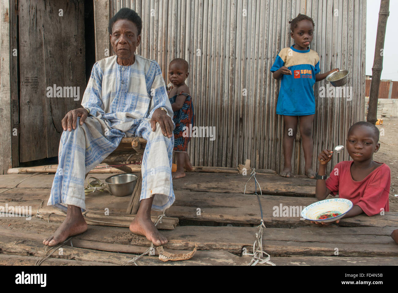 Grandfather and children Stock Photo - Alamy