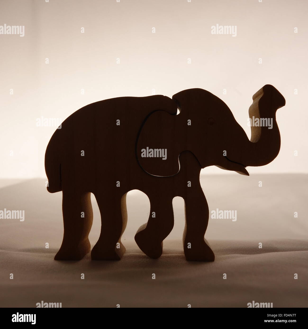 Wooden Elephant Silhouette Stock Photo - Alamy