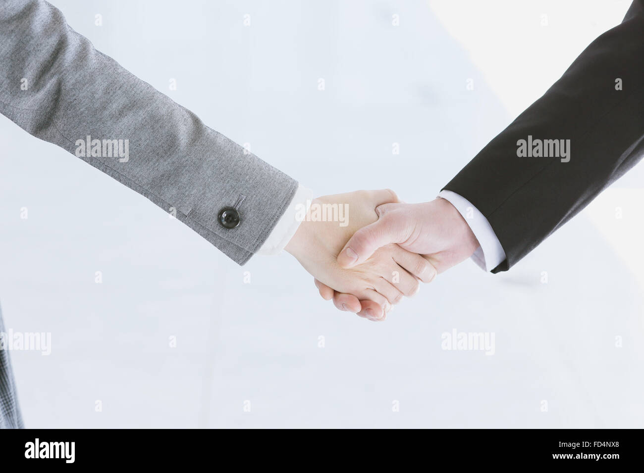 Business people shaking hands Stock Photo - Alamy