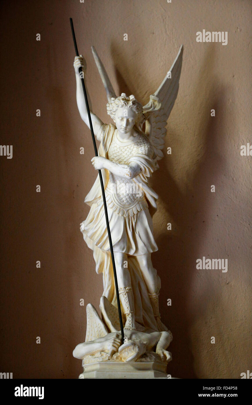Saint Antoine church. Statue. Michael the archangel slaying the dragon ...