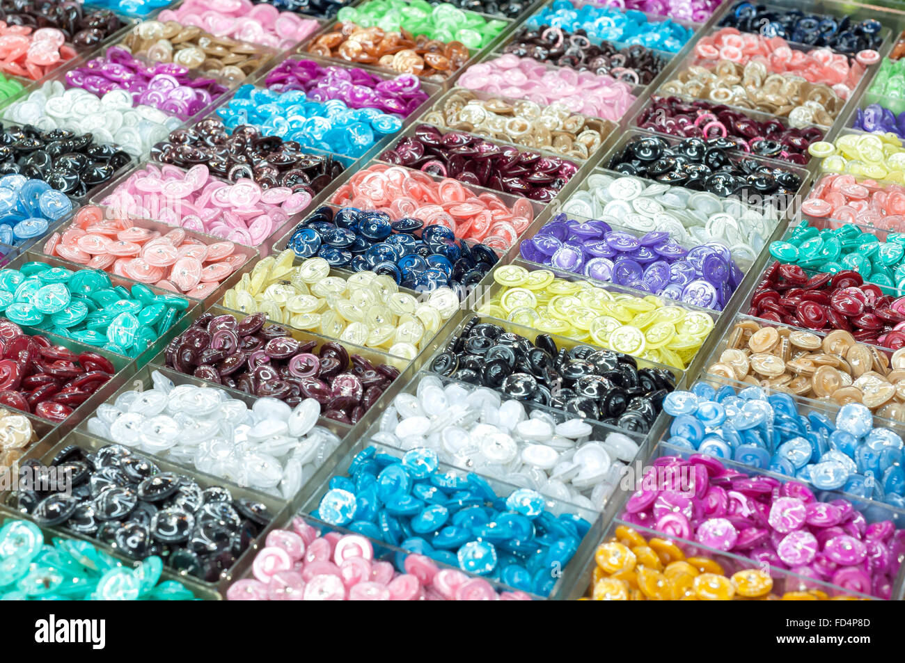 Colourful buttons on display at a market stall Stock Photo - Alamy