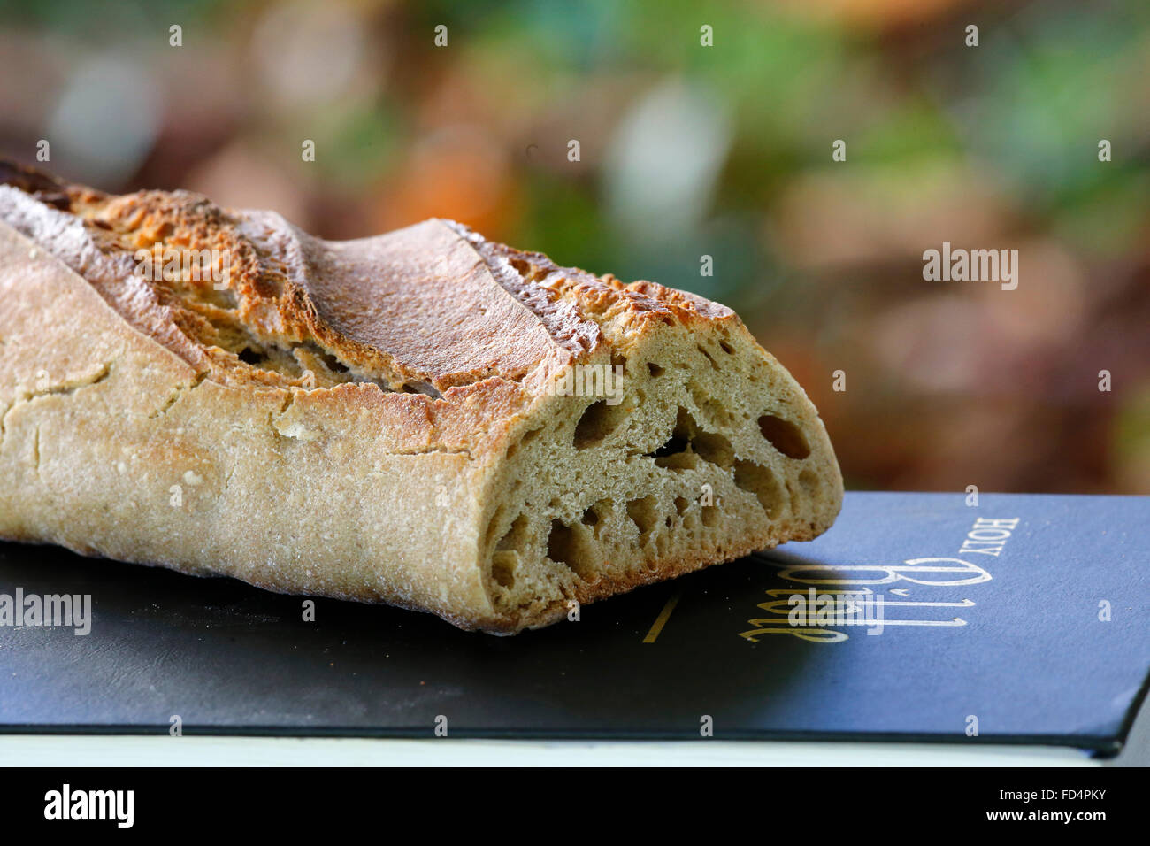 Bread and holy Bible during lent Stock Photo - Alamy