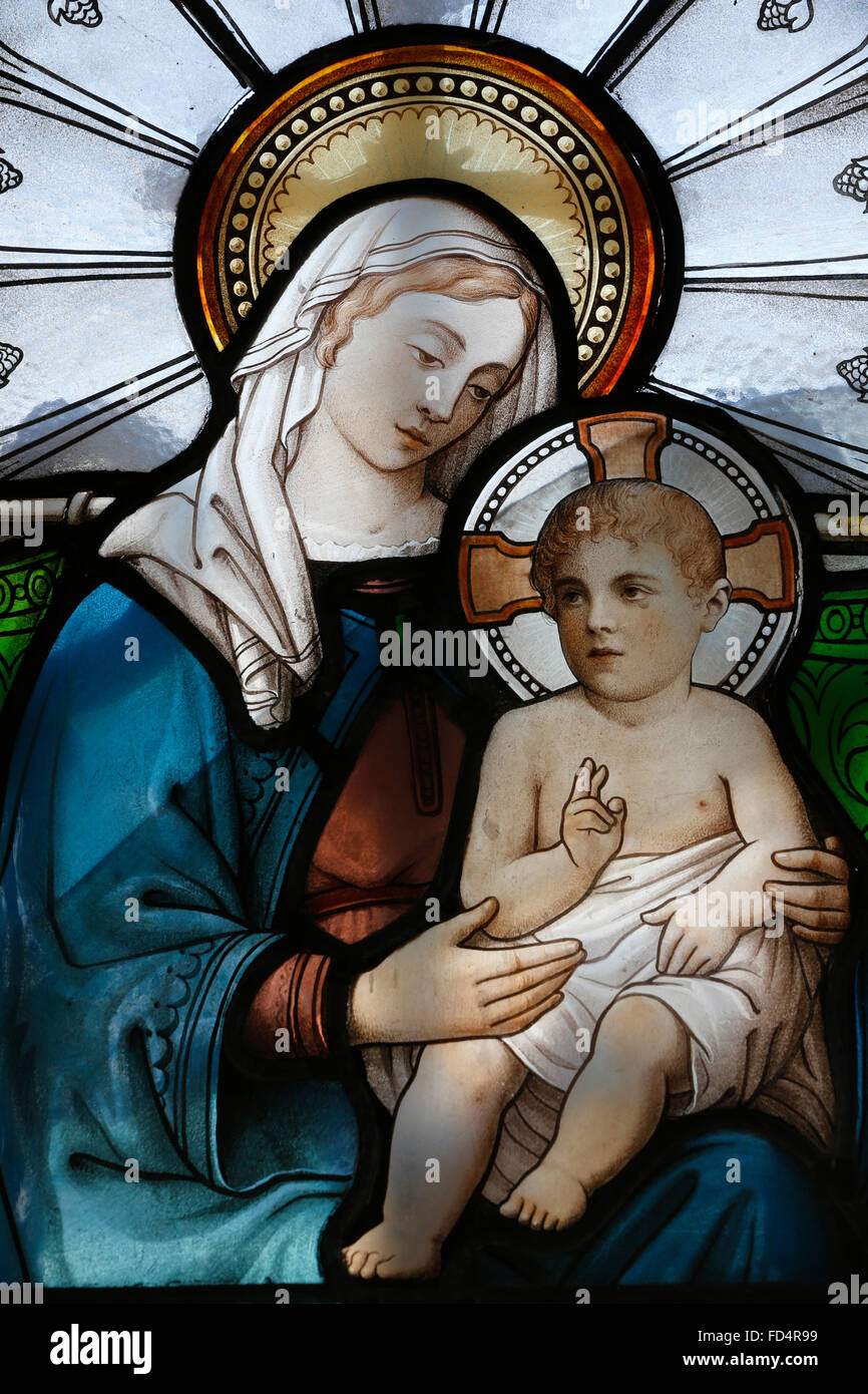 Stained glass window. Virgin and child Stock Photo - Alamy
