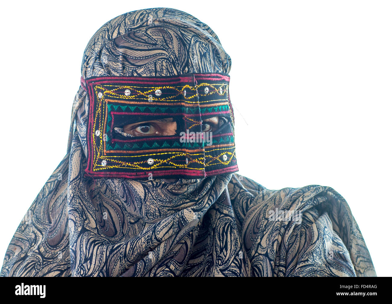 a bandari woman wearing the traditional mask called the burqa on a ...