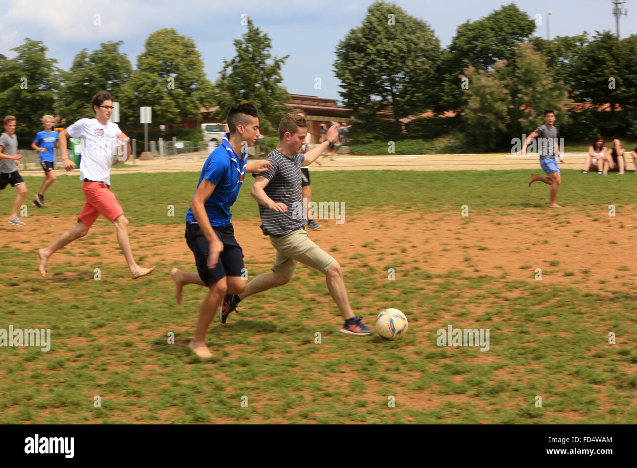 Young pilgrims playing football. Taize ecumenical community Stock Photo ...