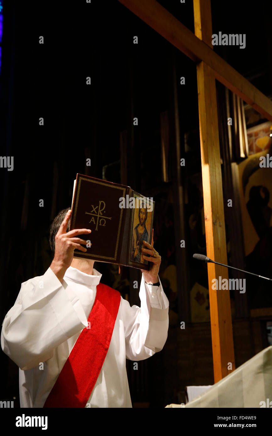 Catholic mass. Gospel proclamation Stock Photo - Alamy