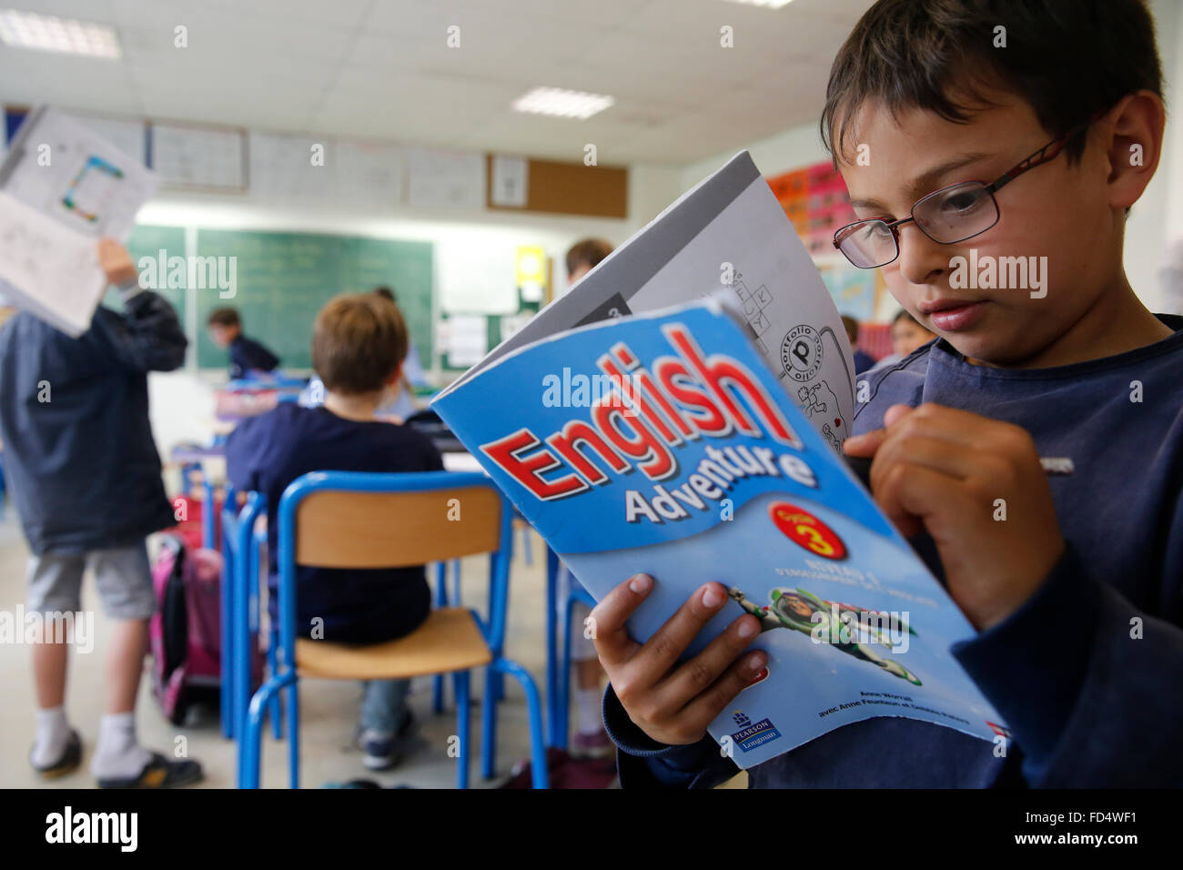 8-year-old boy in class Stock Photo - Alamy