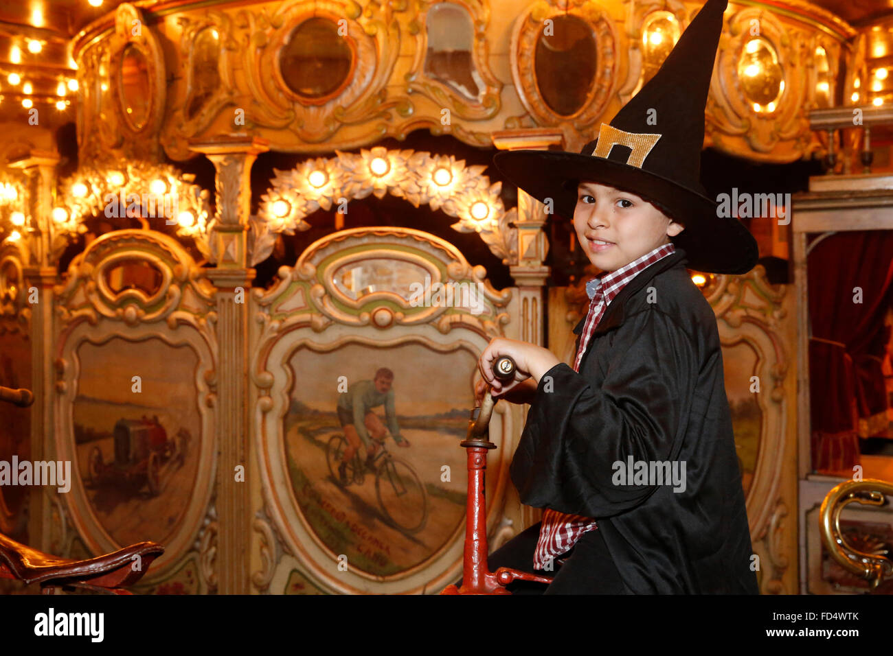 Boy wearing a costume in a fun fair Stock Photo - Alamy