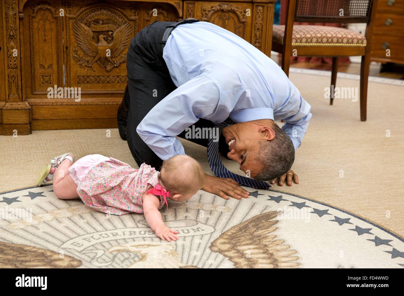 U.S. President Barack Obama joins Ella Rhodes, daughter of Deputy ...