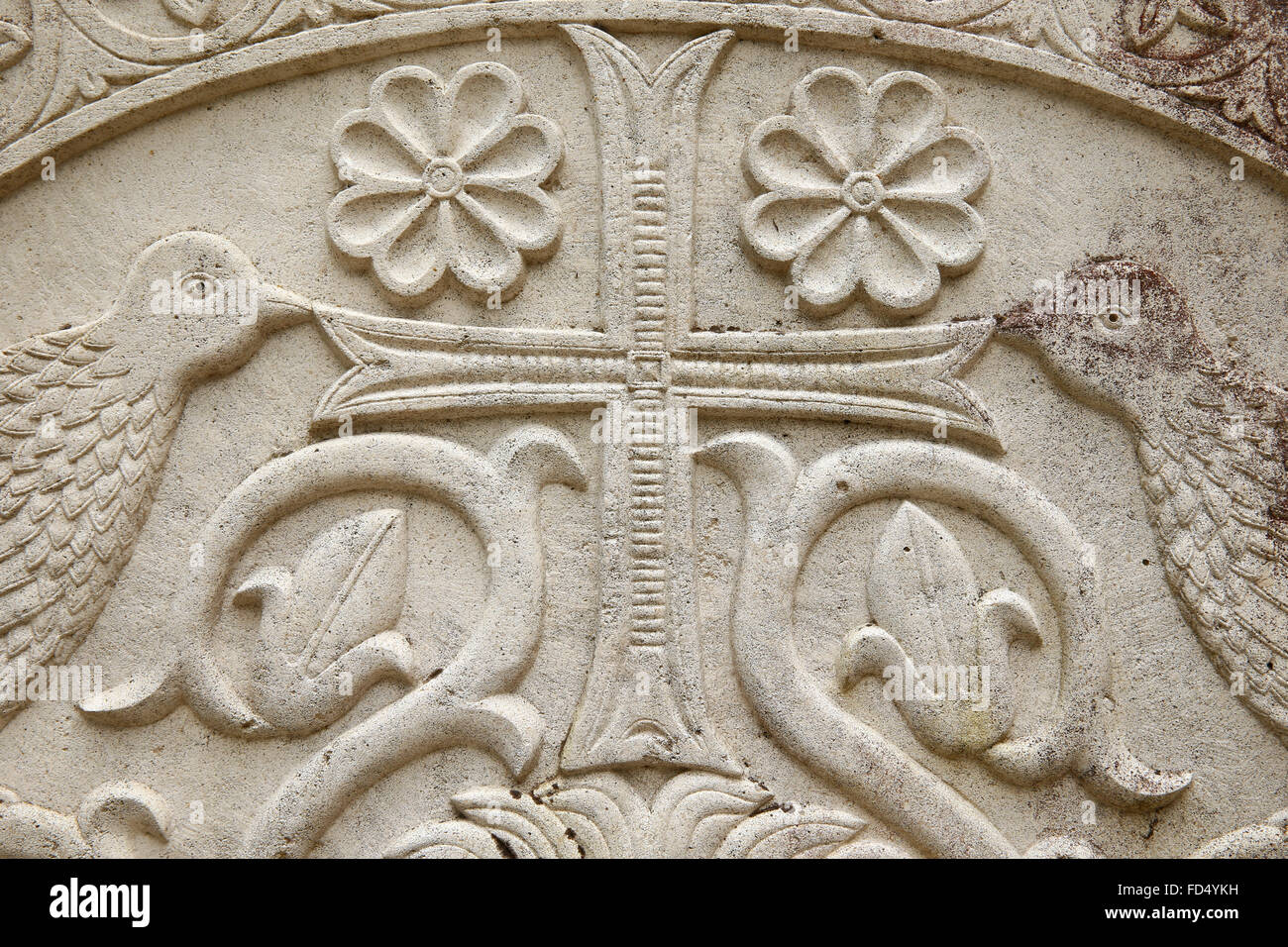 Saint-Antoine-le-Grand orthodox monastery. Stone cross with two birds ...