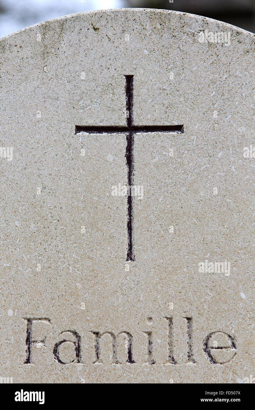 Engraved cross and the inscription "Family" on a tombstone Stock Photo ...