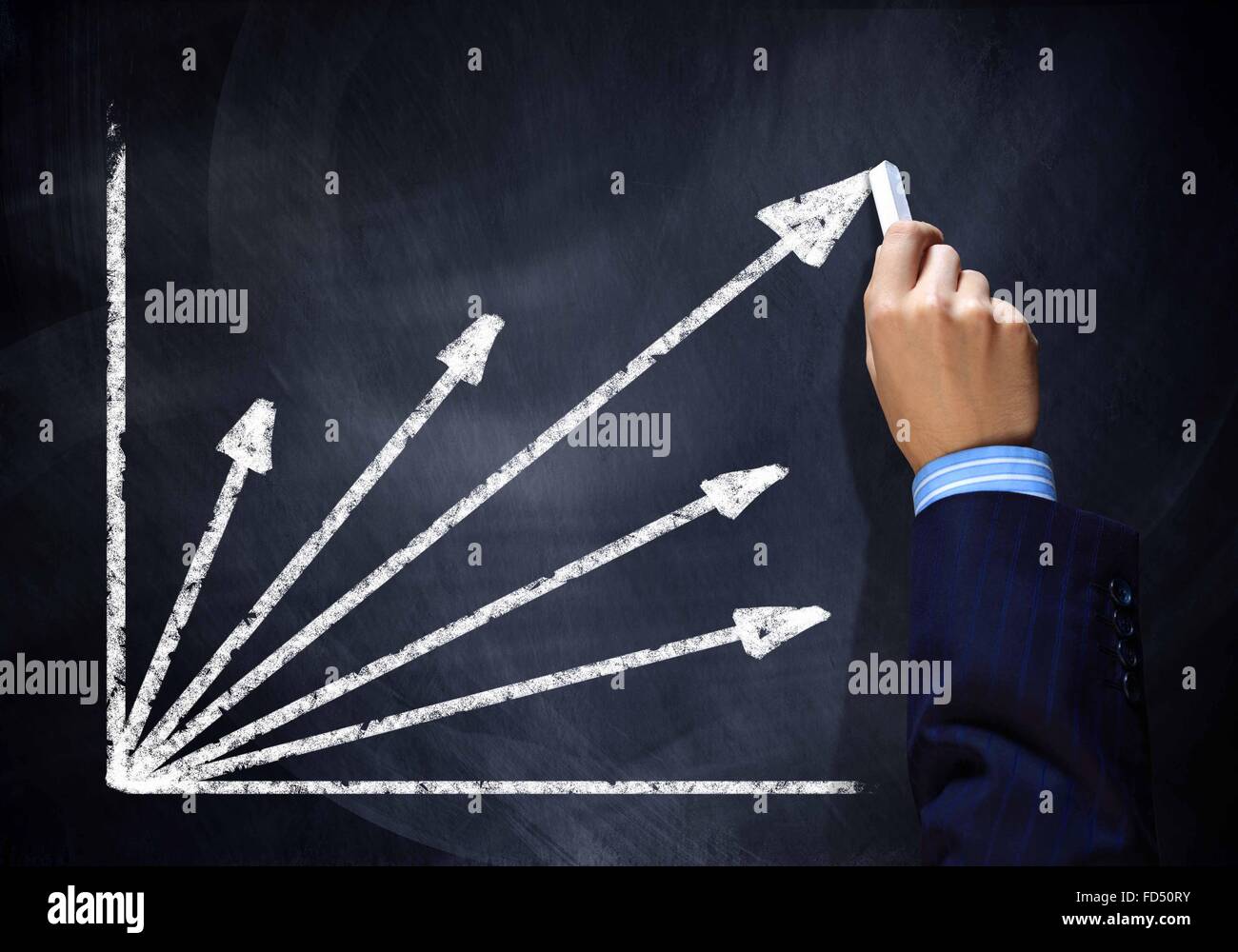 Close up of human hand drawing graphs with chalk Stock Photo - Alamy