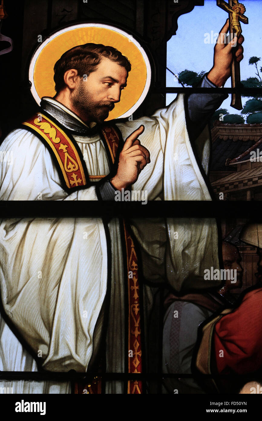 Stained glass window. Missionary catholic priest in Asia Stock Photo ...