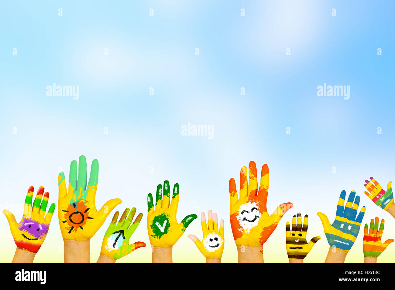 Image of human hands in colorful paint with smiles Stock Photo - Alamy