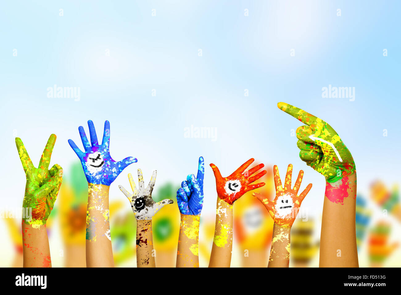 Image of human hands in colorful paint with smiles Stock Photo - Alamy