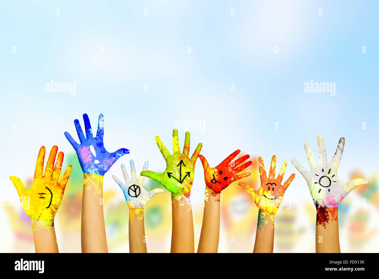 Image of human hands in colorful paint with smiles Stock Photo - Alamy