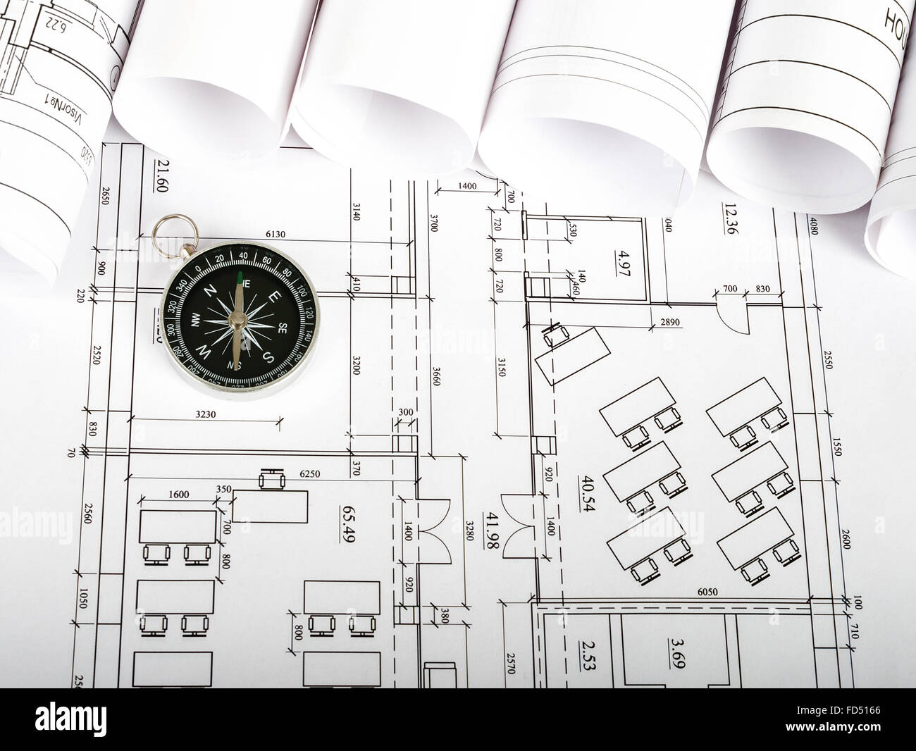Compass on blueprint Stock Photo - Alamy